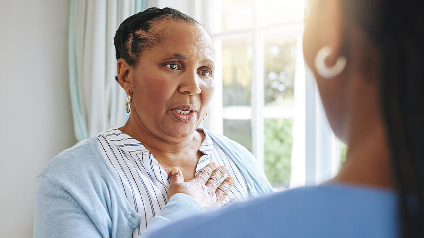 Woman talking from the heart with another person | Alzheimer's Society